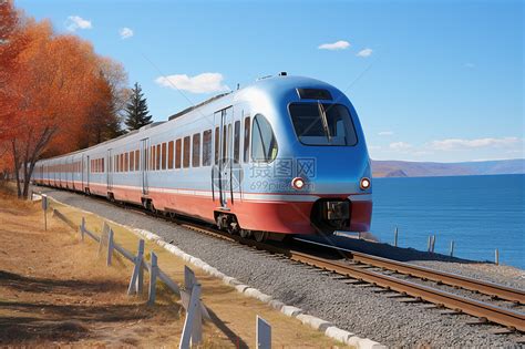 秋日湖畔的火车高清图片下载 正版图片600819951 摄图网