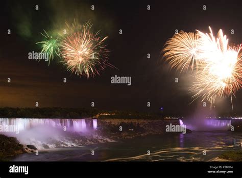 The American Falls and Horseshoe Falls lit up at night with fireworks ...