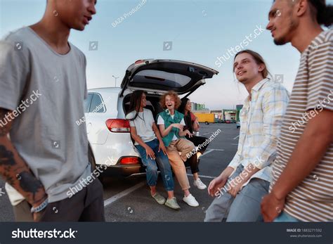 Friends Hanging Out Talking Outside Over 2 071 Royalty Free Licensable