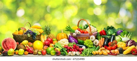 ผักสดและผลไม้พื้นหลัง ภาพสต็อก 671214985 Shutterstock