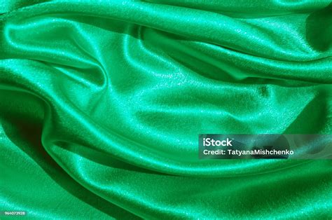 텍스처 직물 배경입니다 고급 스러운 직물 또는 액체 파도의 물결 그런 지 주름 실크 새틴 질감의 벨벳 소재 또는 고급 스러운 크리스마스 또는 우아한 배경 추상적인 배경 그린