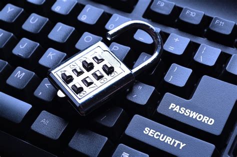 Premium Photo Security Lock On Black Computer Keyboard