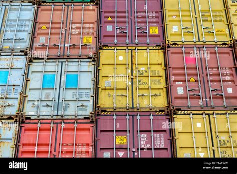 Standard Shipping Containers In A Container Terminal Before Loading On
