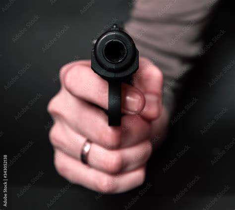 Male Hand With Gun Isolated On Black Background Man With A Gun Ready