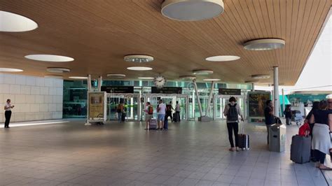 Passengers Walking Inside The International Airport In Lisbon Stock