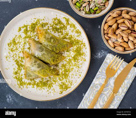 Pistachio Baklava On White Marble Traditional Middle Eastern Dessert