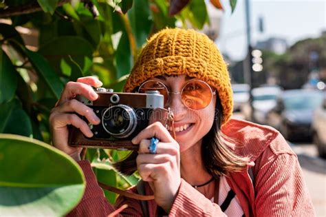Happy Girl With Camera Walks Around The City Young Tourist Sightseeing And Walking Around The