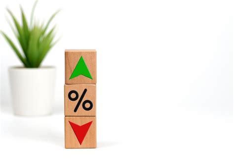 Premium Photo Wooden Blocks With A Green Arrow And A Red Arrow