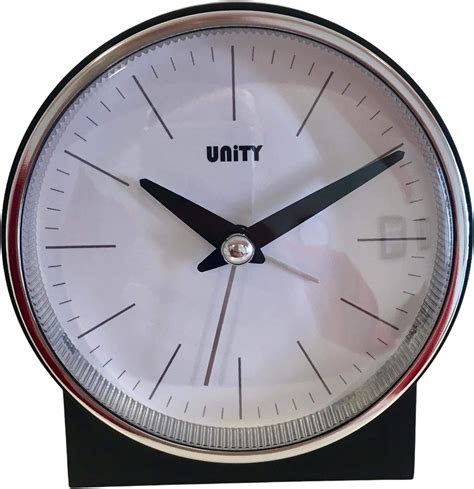 Amazon Com Unity Bell Alarm Clock Black 4 1 X 3 75 X 2 8 Home Kitchen