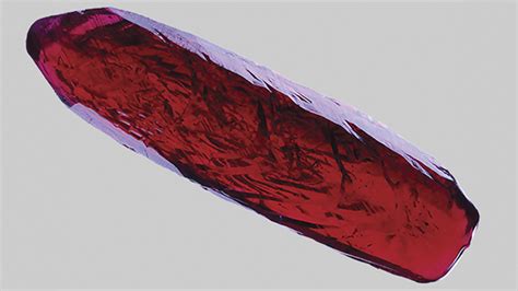 Flame Fusion Synthetic Ruby Boule With Flux Synthetic Ruby Overgrowth Gems And Gemology