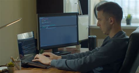 man coding html programming on screen stock footage sbv 338374725