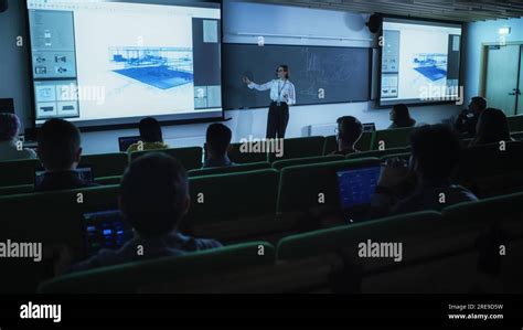 Young Female Teacher Giving A Data Science Lecture To Diverse