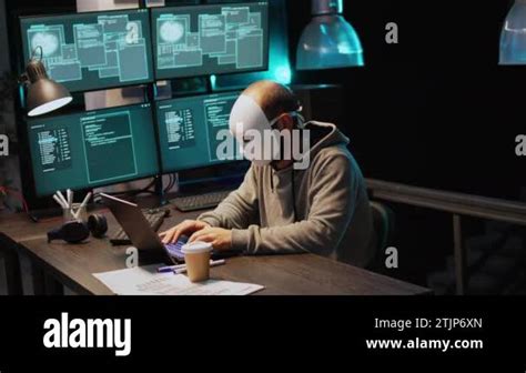Cyber Impostor Wearing Mask Hacking Database Servers Hacker With Hood