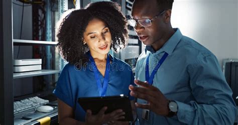 Server Room People And Digital Tablet For Inspection Maintenance And System Update Software