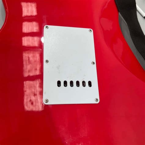 Red Guitar With Living Stone Amplifier Pick Up Onlys