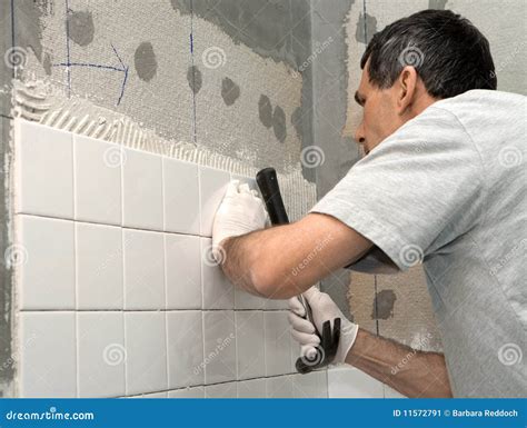 Man Tiling A Wall Stock Image Image