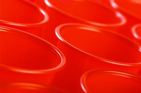 Premium Photo Red Disposable Plastic Glasses