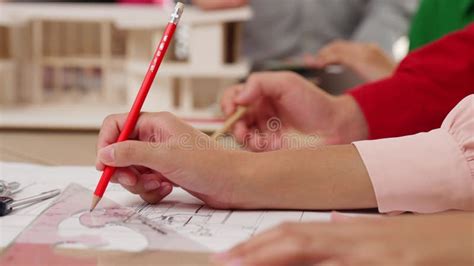 skilled interior designer team focusing on their performance