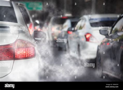 Air Pollution From Car Exhaust Smoke Traffic In The City Reducing