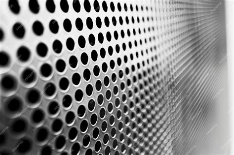 Premium Photo Abstract Close Up Of Perforated Metal Surface Modern Industrial Texture And Pattern