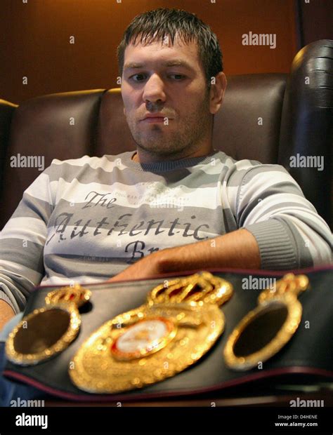 The Wba Heavy Weight World Champion Ruslan Chagaev Poses With His Champion Belt At