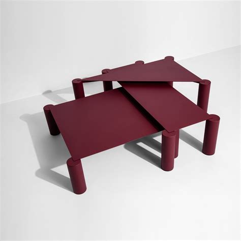 max enrich creates nesting coffee tables with bulky legs and slender tops