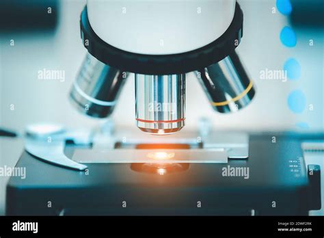 Close Up Of Microscope With Test Sample In Medical Research Lab Or Science Laboratory Stock