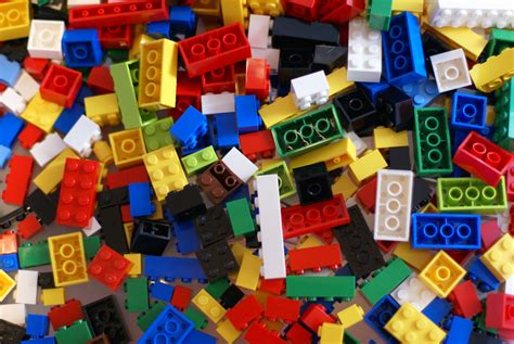 A Pile Of Colorful Legos Sitting On Top Of A Table Photo Free Lego