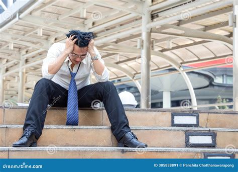 Lonely Man Lost In A Depression Sitting On The Stairs Serious Engineer