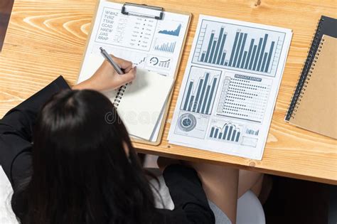 Top View Diverse Analyst Team Analyzing Financial Data Meticulous