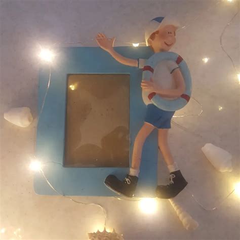 کمدا قیمت و خرید قاب عکس عروسکی پسرونه رنگ مطابق با عکس