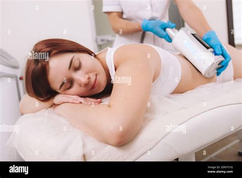 Lovely Young Woman Enjoying Endospheres Skin Tightening Massage By
