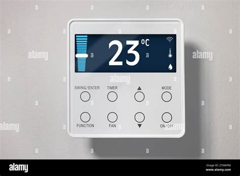 Thermostat Displaying Temperature In Celsius Scale And Different Icons Smart Home Device On