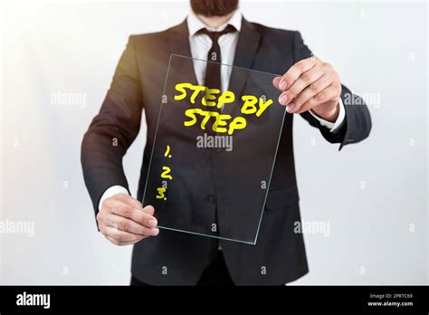conceptual display step by step word written on slow progress road to