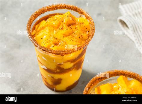 Healthy Frozen Mango Mangonada Cocktail Drink With Chamoy Spice Stock