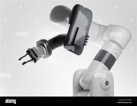 A Modern Looking Programmable Robotic Arm For Use In Automatic Manufacturing Production Generic