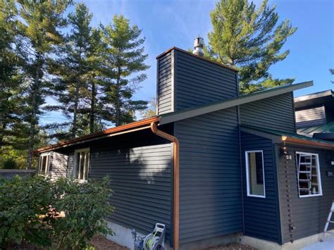 Mastic Carvedwood Vinyl Siding And Thermo Tech Replacement Windows In Plover WI Oakwood Exteriors