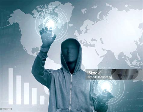 hacker in black hoodie touching virtual screen with chart bar stock