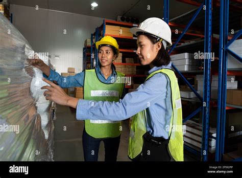 Female Warehouse Worker Working At The Storehouse Logistics Supply Chain And Warehouse