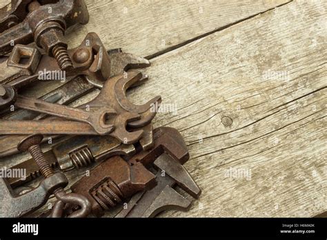 Dirty Set Of Hand Tools On A Wooden Background Old Rusty Tools Equipment For Locksmith And