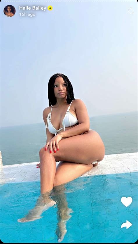 Halle Bailey Shows Off Bare Belly In A Tiny White Bikini For Rare Full