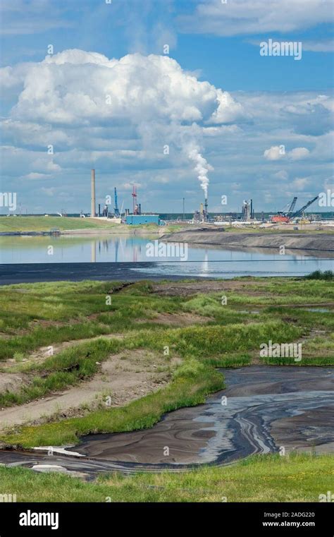 Oil Industry Pollution Tailings Settling Pond With Residual Crude Oil