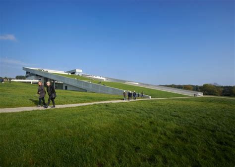 Moesgaard Museum By Henning Larsen Has A Sloping Turfed Roof