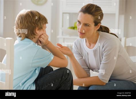 Mother Having Discussion With Son Stock Photo Alamy