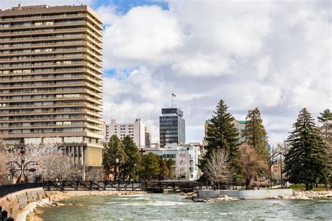 Reno Nevada Skyline As Seen From The Shoreline Of Truckee River