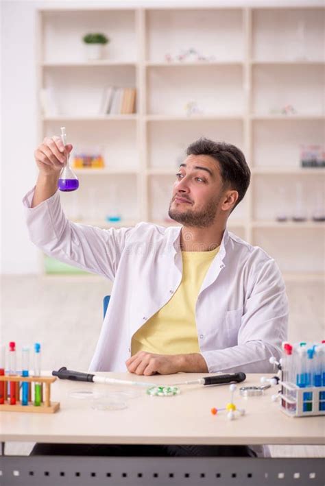 Young Male Chemist Sitting At The Lab Stock Image Image Of Science