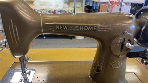 Bid Now Antique New Home Sewing Machine And Cabinet Invalid Date Mst