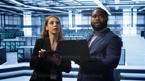 Manager In Data Center Supervising Worker Running Error Checking