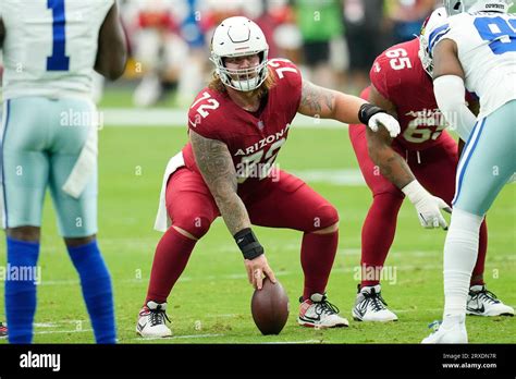 Arizona Cardinals Guard Hjalte Froholdt Gives Signals To Other Linemen