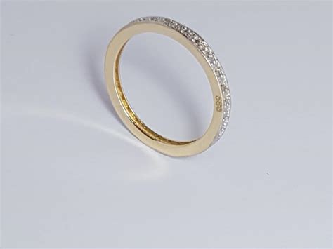 Oqros Samkaulebi სინჯი 585 რგოლი ბრილიანტებით წონა 1 6 ფასი 420ლარი Facebook